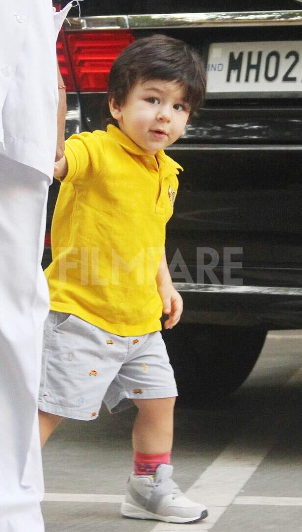 Taimur Ali Khan shines bright in yellow | Filmfare.com