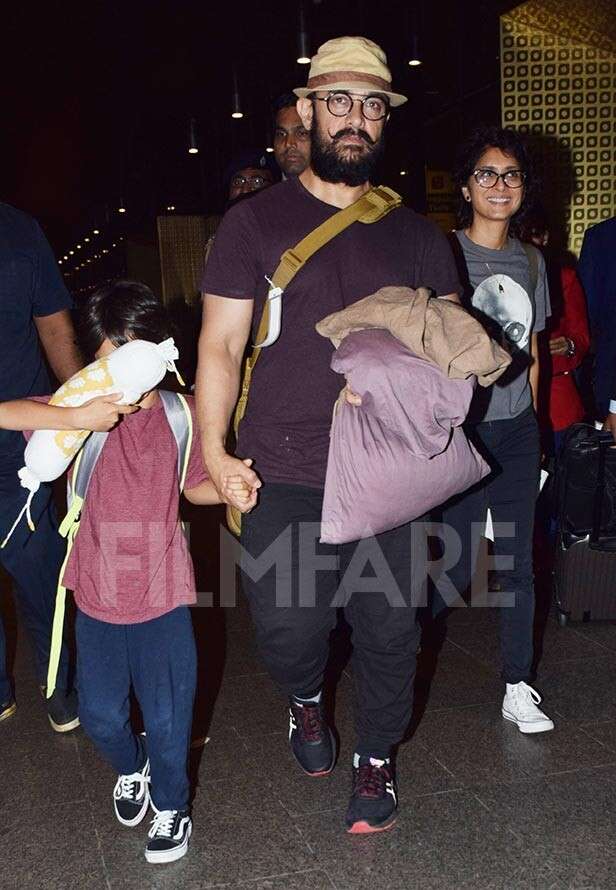 Aamir Khan, Kiran Rao and Azad Rao Khan return from their London vacay ...