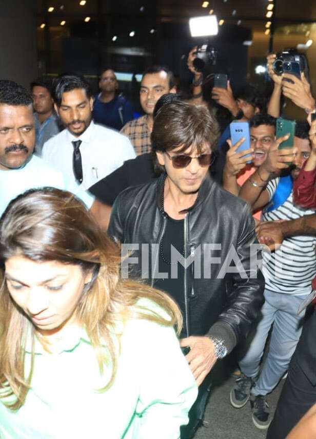 Shah Rukh Khan looks dapper as he arrives at the airport. See pics ...